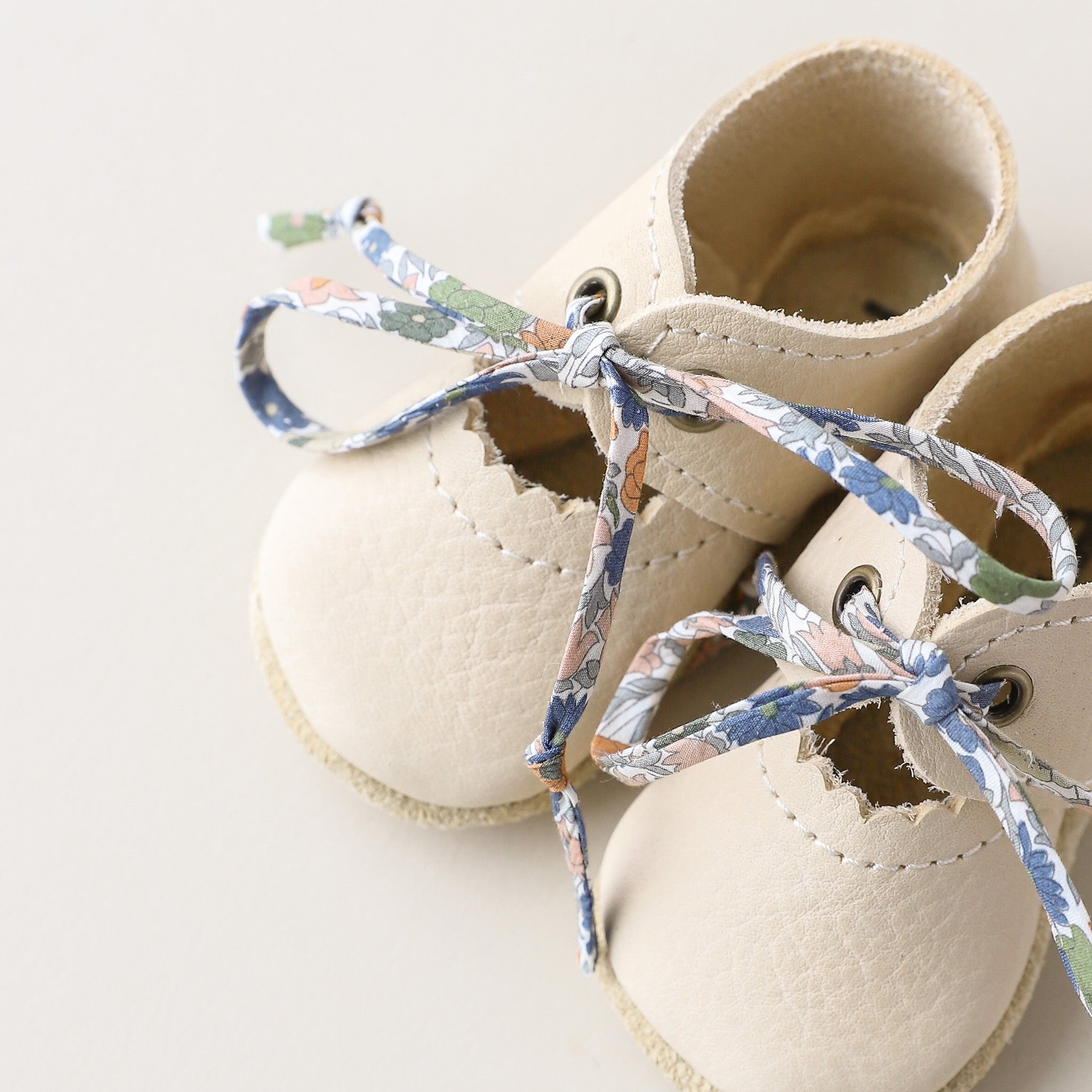 Cream leather baby Bella Janes – Sun & Lace